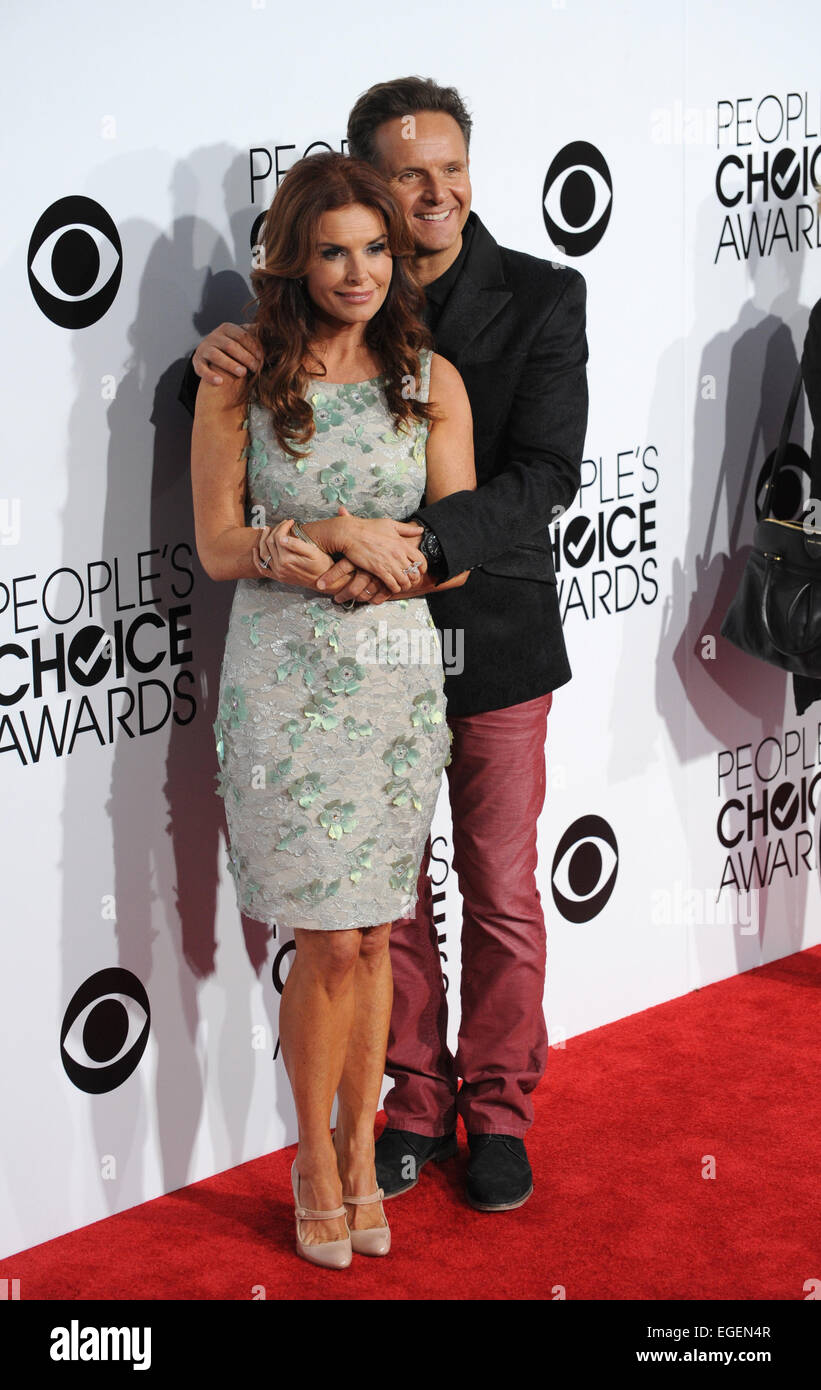 LOS ANGELES, CA - JANUARY 8, 2014: Producer Mark Burnett & wife Roma ...