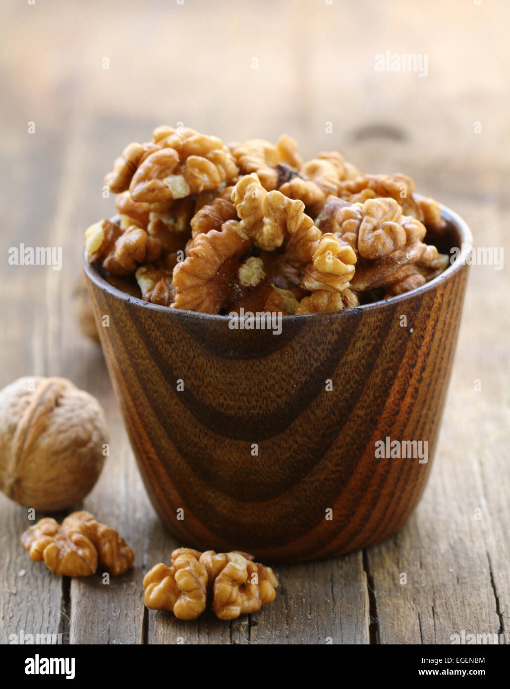 natural organic walnuts on a wooden table Stock Photo - Alamy