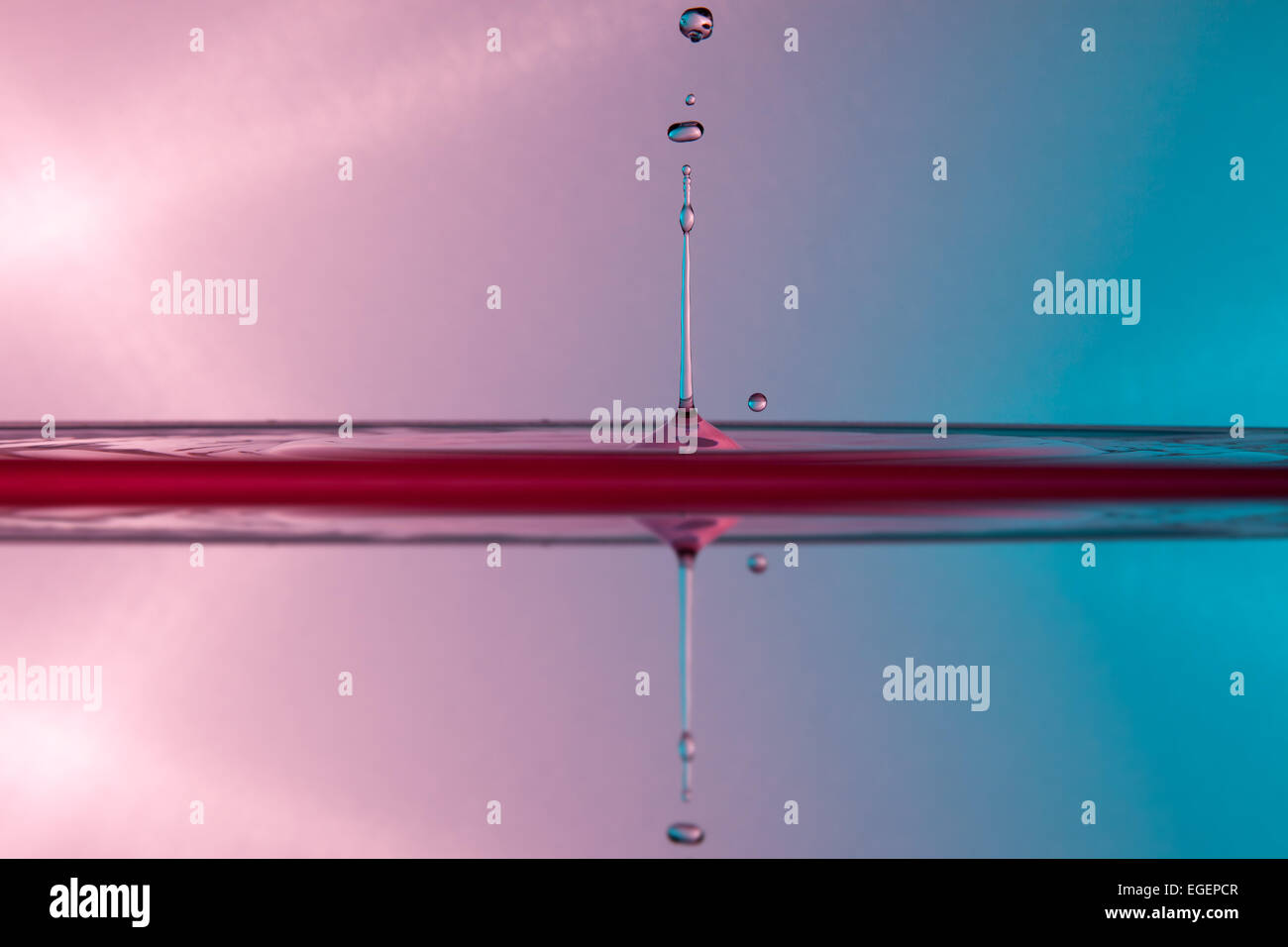 Water drop hitting the water surface Stock Photo - Alamy