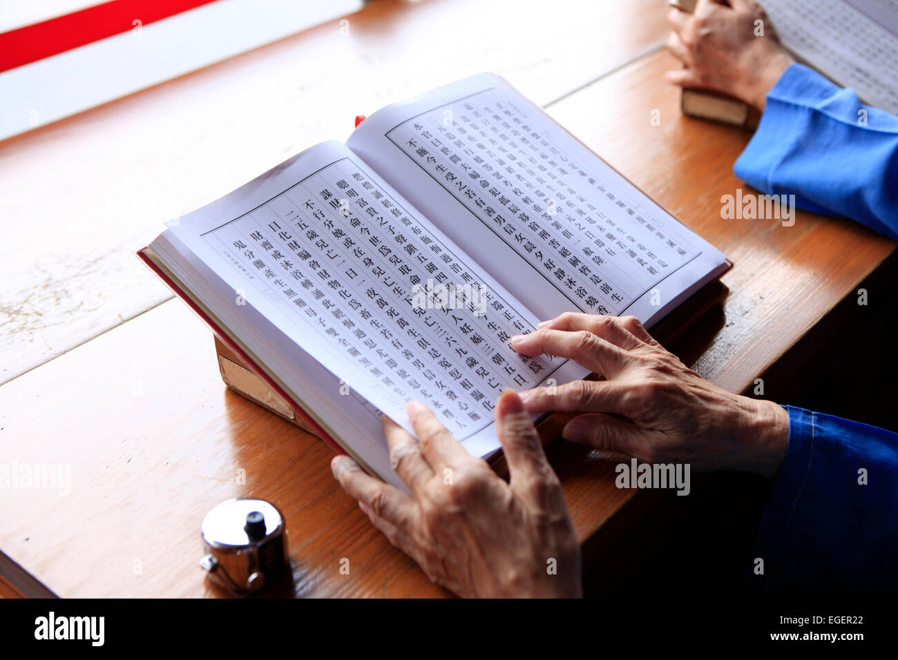 People Reading Books At A Temple In China Stock Photo - Alamy