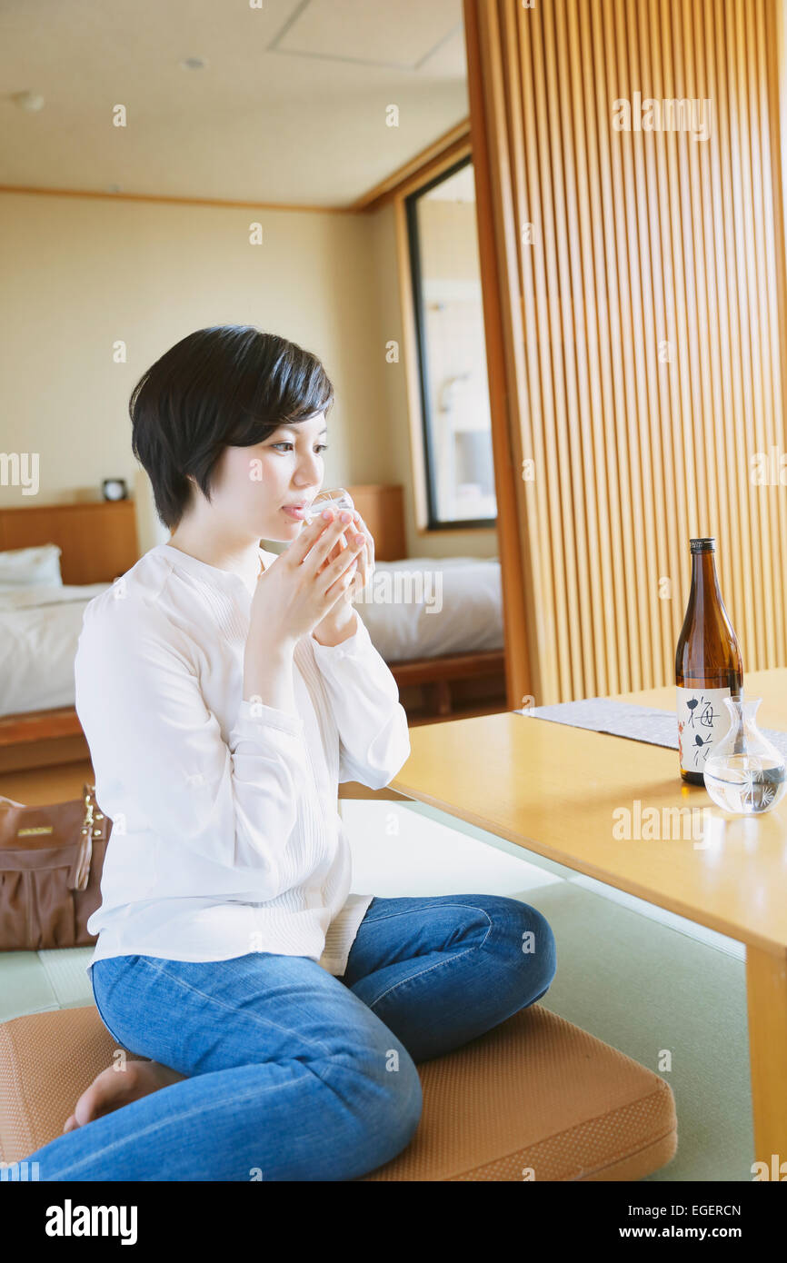 Drinking sake hi-res stock photography and images - Alamy