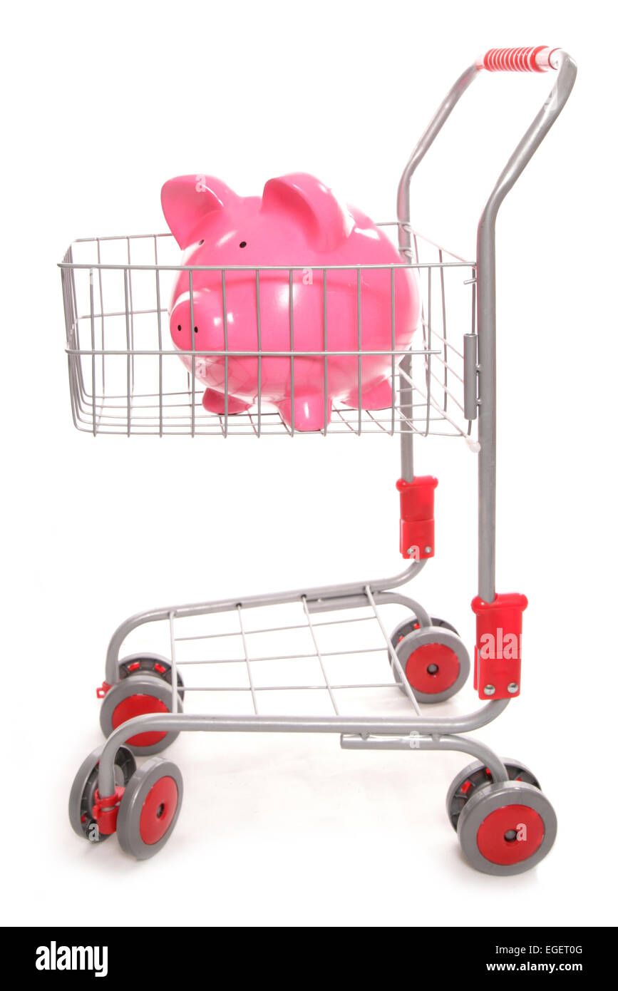 shopping trolley with piggy bank cutout Stock Photo - Alamy