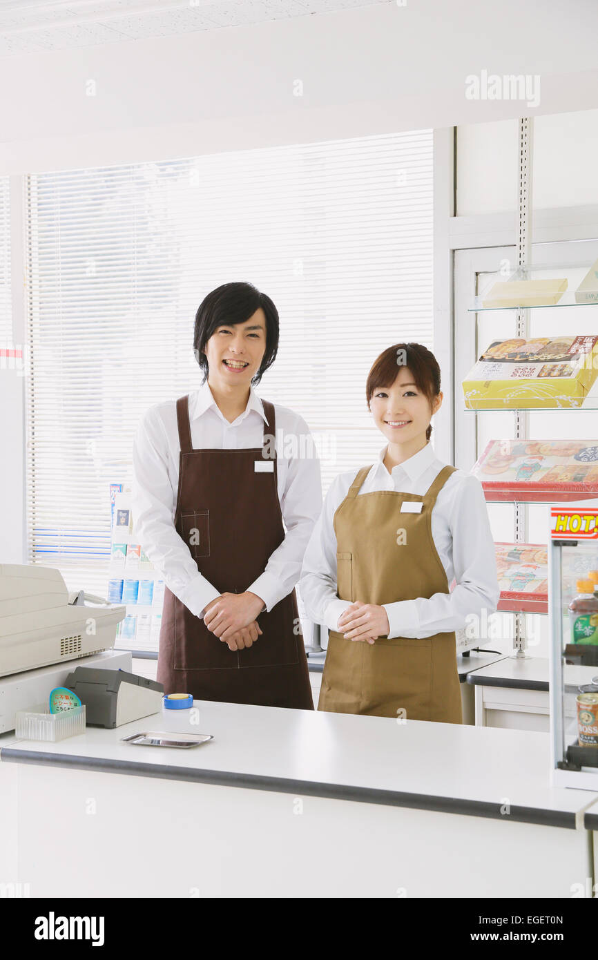Convenience store staff working Stock Photo - Alamy