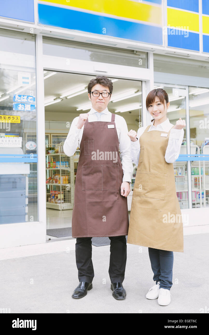 Convenience store staff working Stock Photo - Alamy