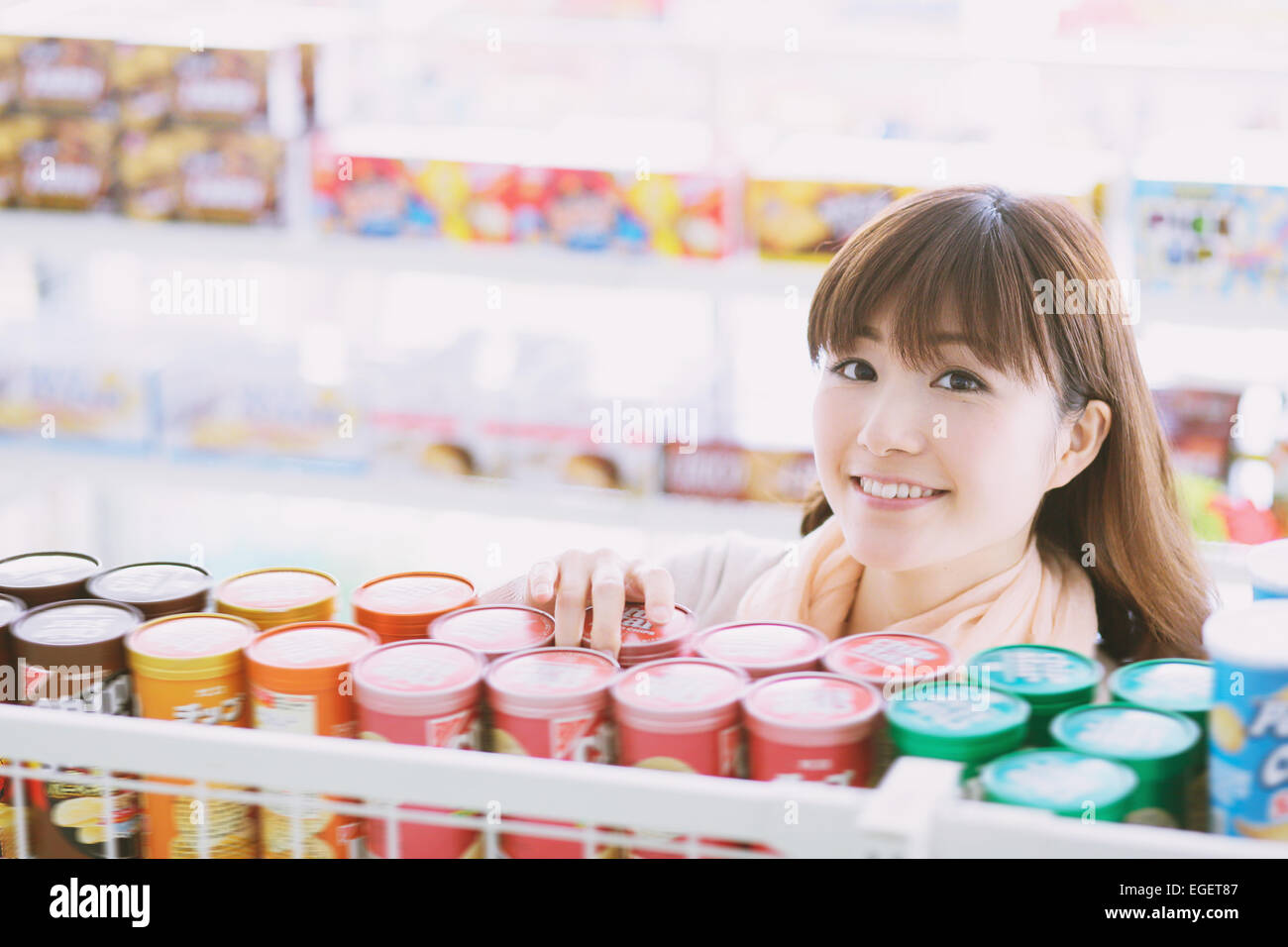 Young Japanese woman in a convenience store Stock Photo - Alamy