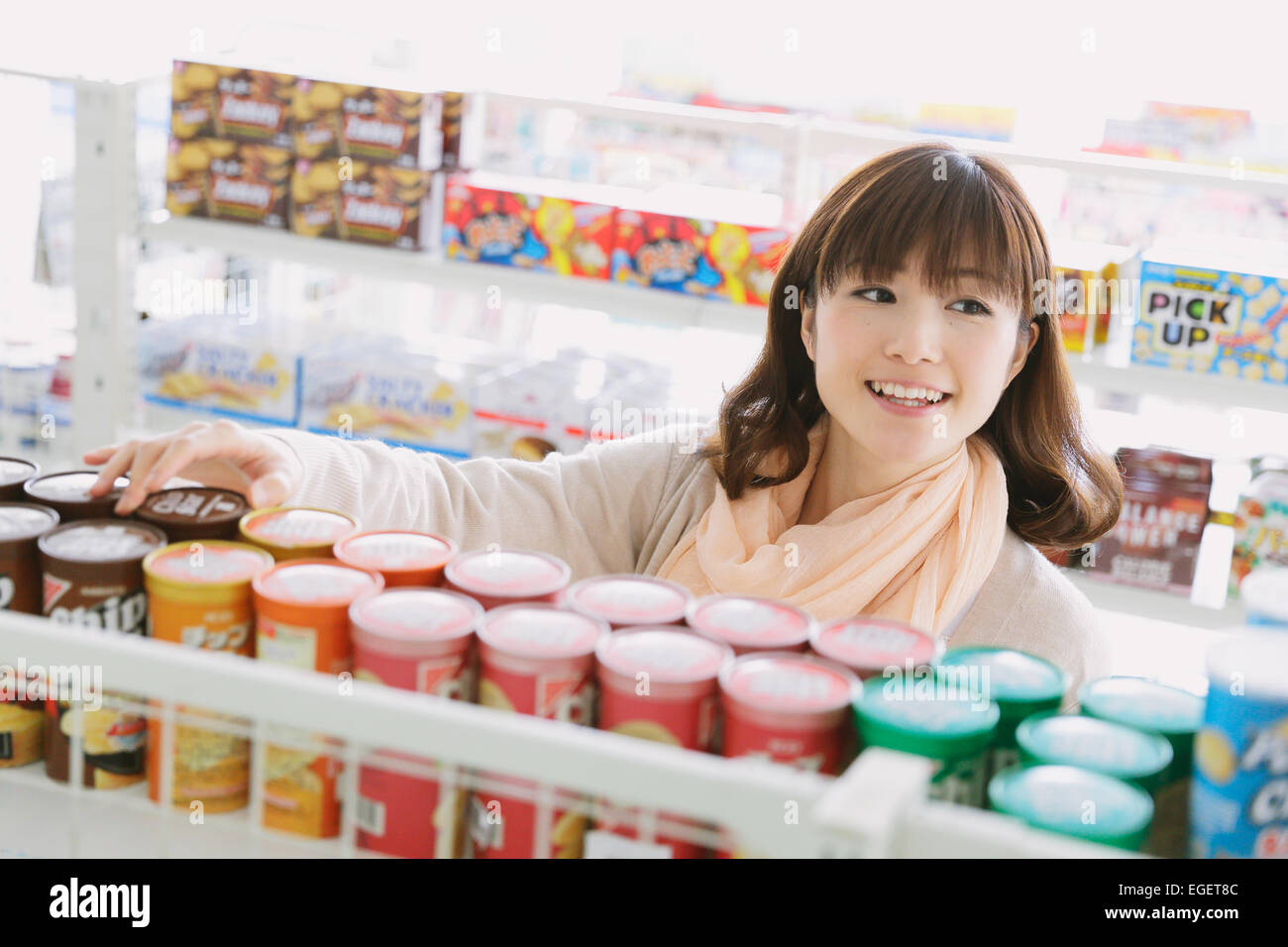 Young Japanese woman in a convenience store Stock Photo - Alamy