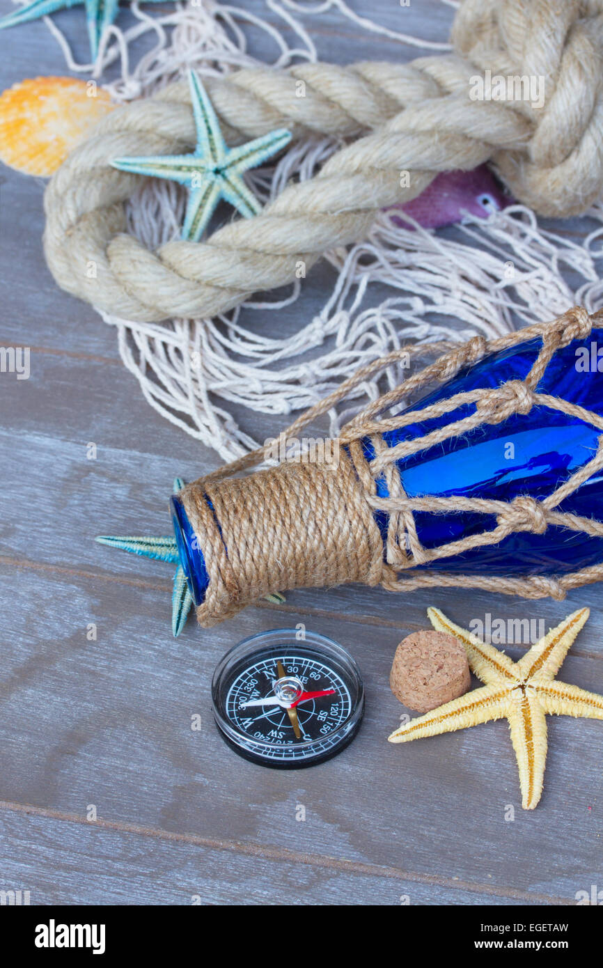 compass on fishing net Stock Photo - Alamy