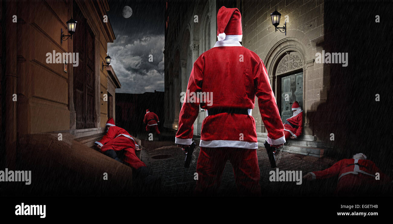 Santa Clause showdown in the terrific dark alley Stock Photo - Alamy