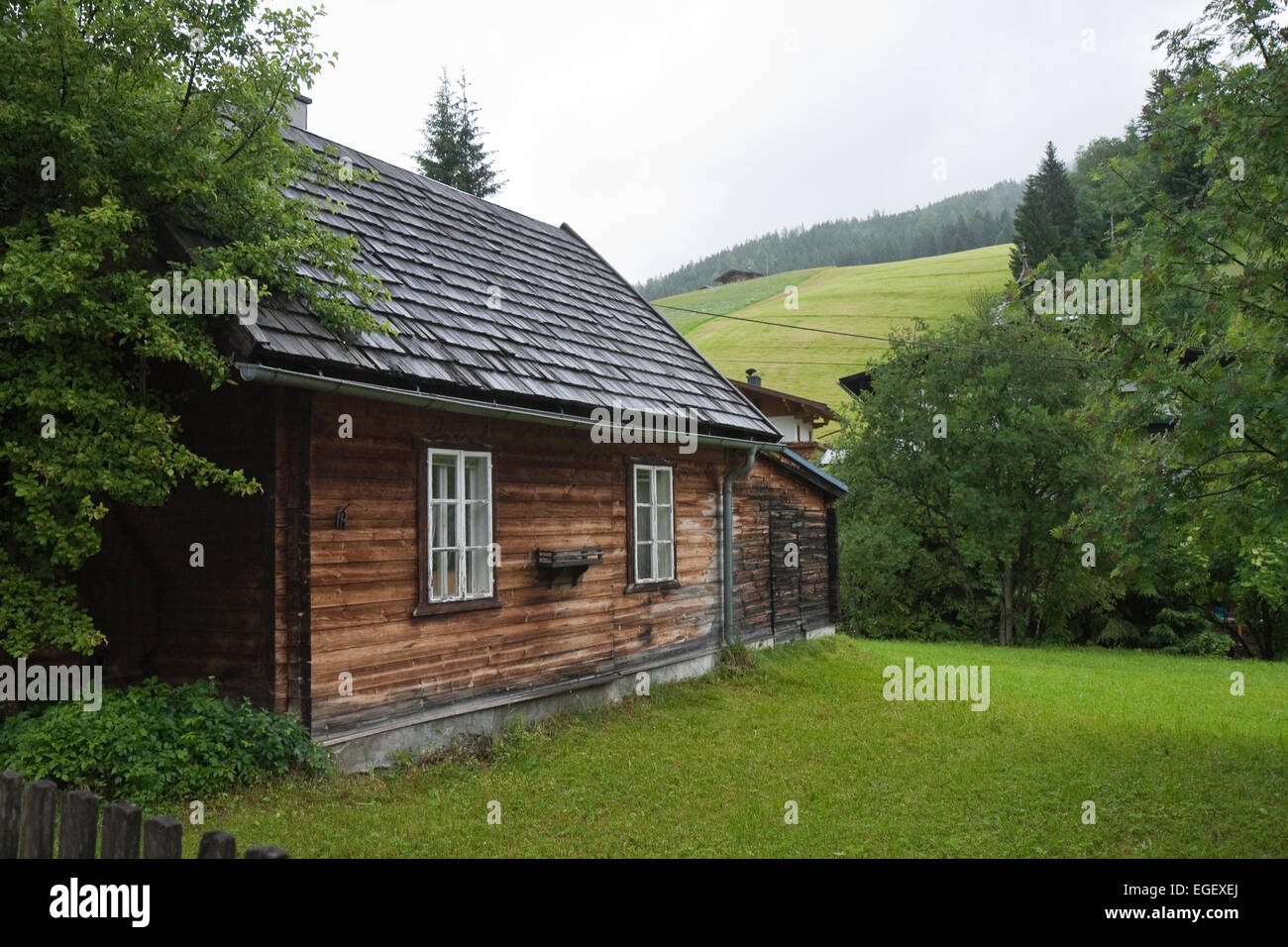 Small House Wooden House in the Austrian Alps Stock Photo - Alamy
