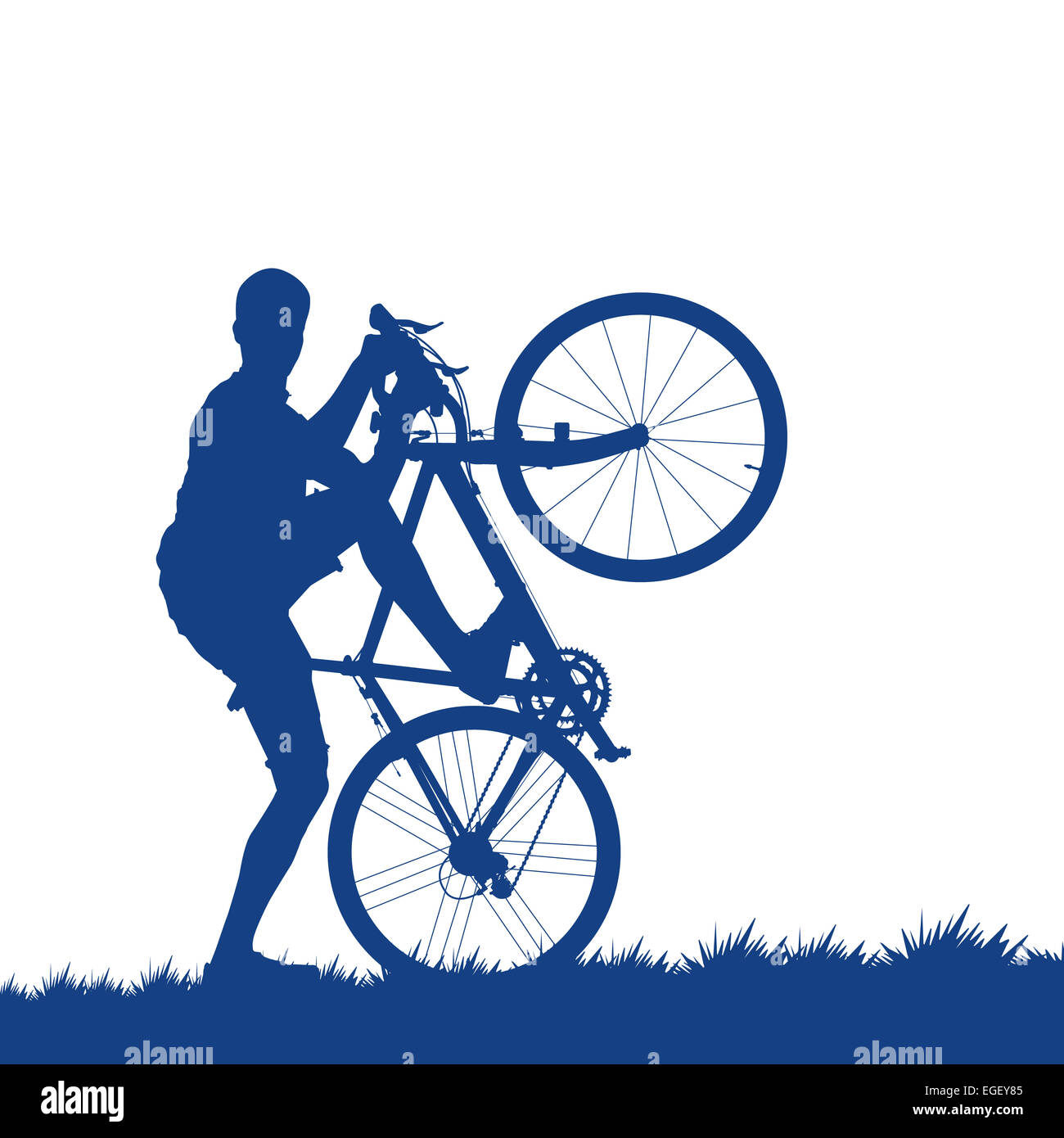 Silhouette of a cyclist on the grass Stock Photo - Alamy