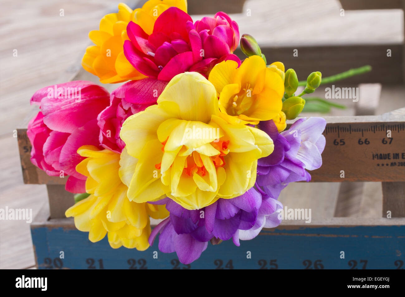 posy of spring flowers on wooden table Stock Photo - Alamy
