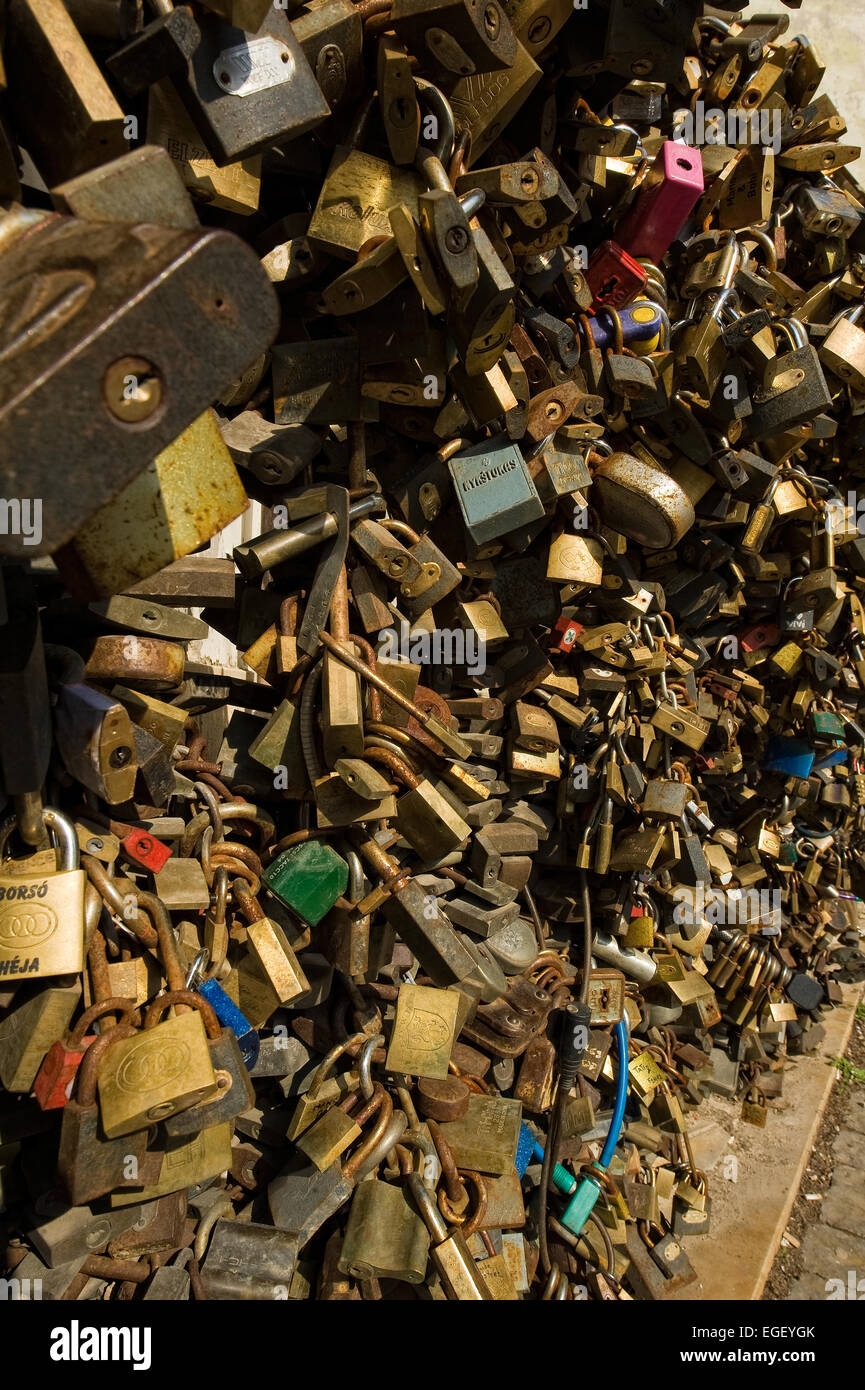 Lots of metal locks linked together Stock Photo - Alamy