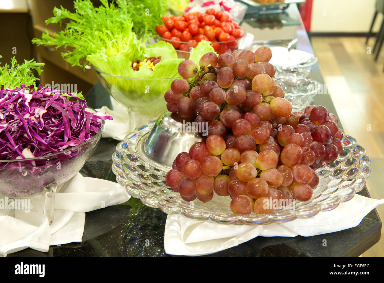 Grapes and vegetable in a buffet line Stock Photo - Alamy