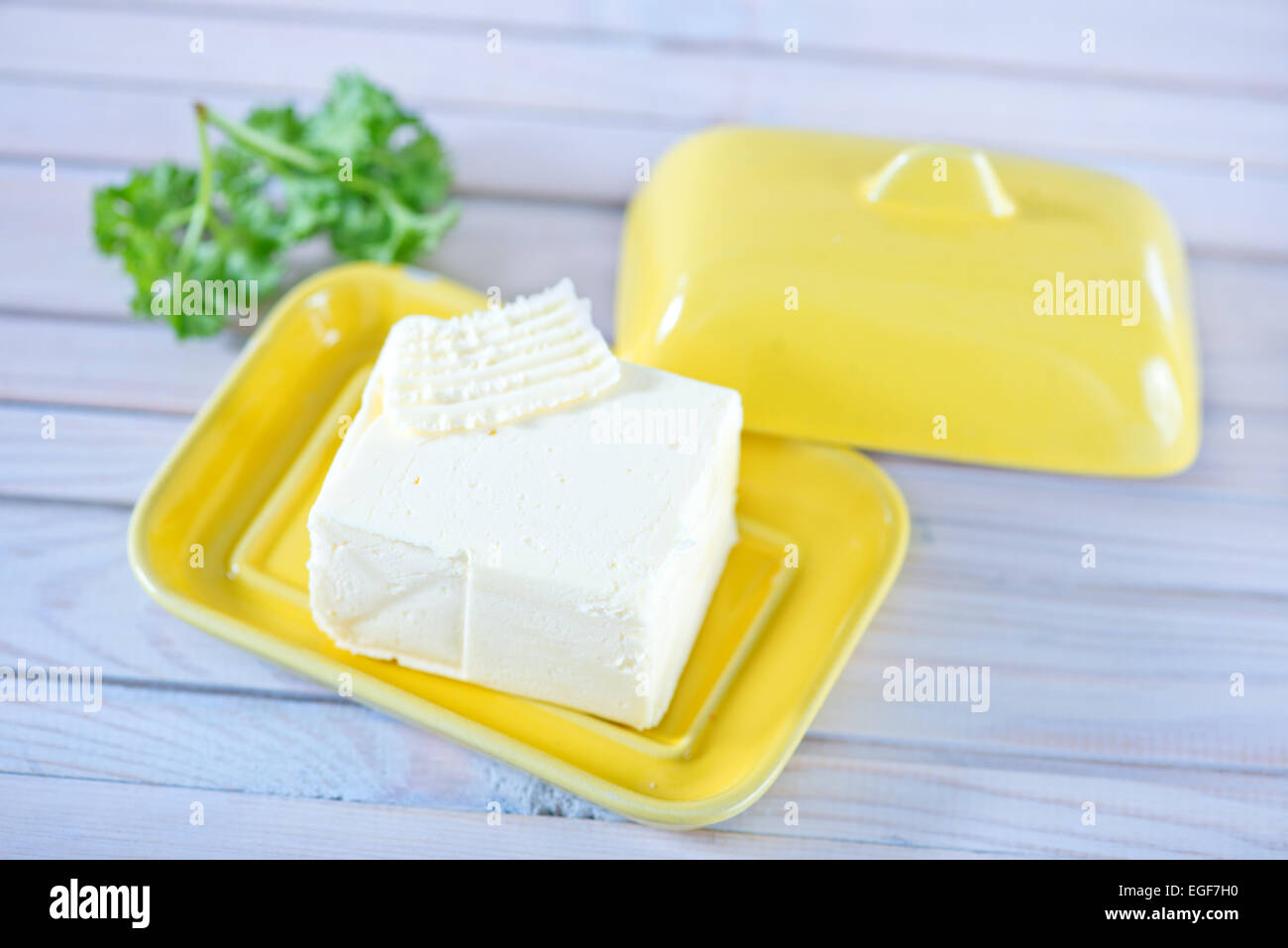 butter on plate and on a table Stock Photo - Alamy
