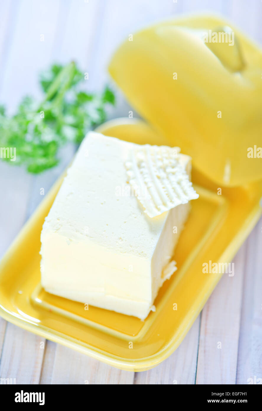 butter on plate and on a table Stock Photo - Alamy