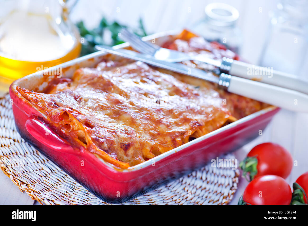 lasagna in bowl and on a table Stock Photo - Alamy