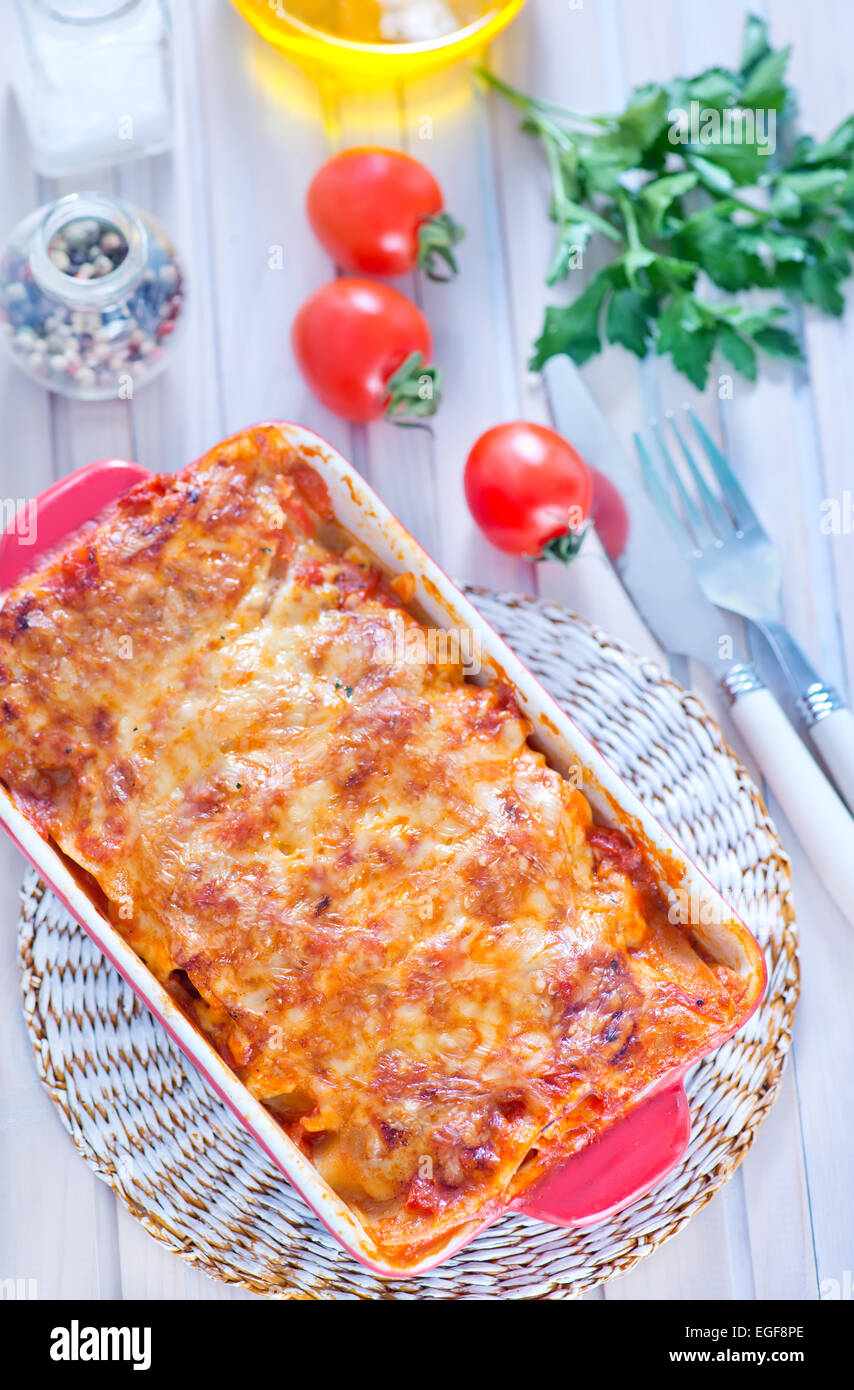 lasagna in bowl and on a table Stock Photo - Alamy