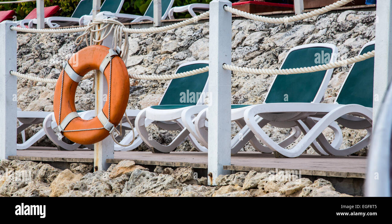 Life rings stand at the ready along the beach at a Caribbean resort ...