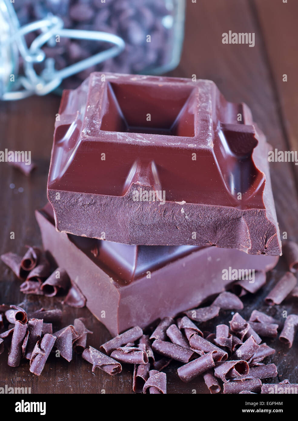 chocolate on the wooden table, chocolate background Stock Photo - Alamy