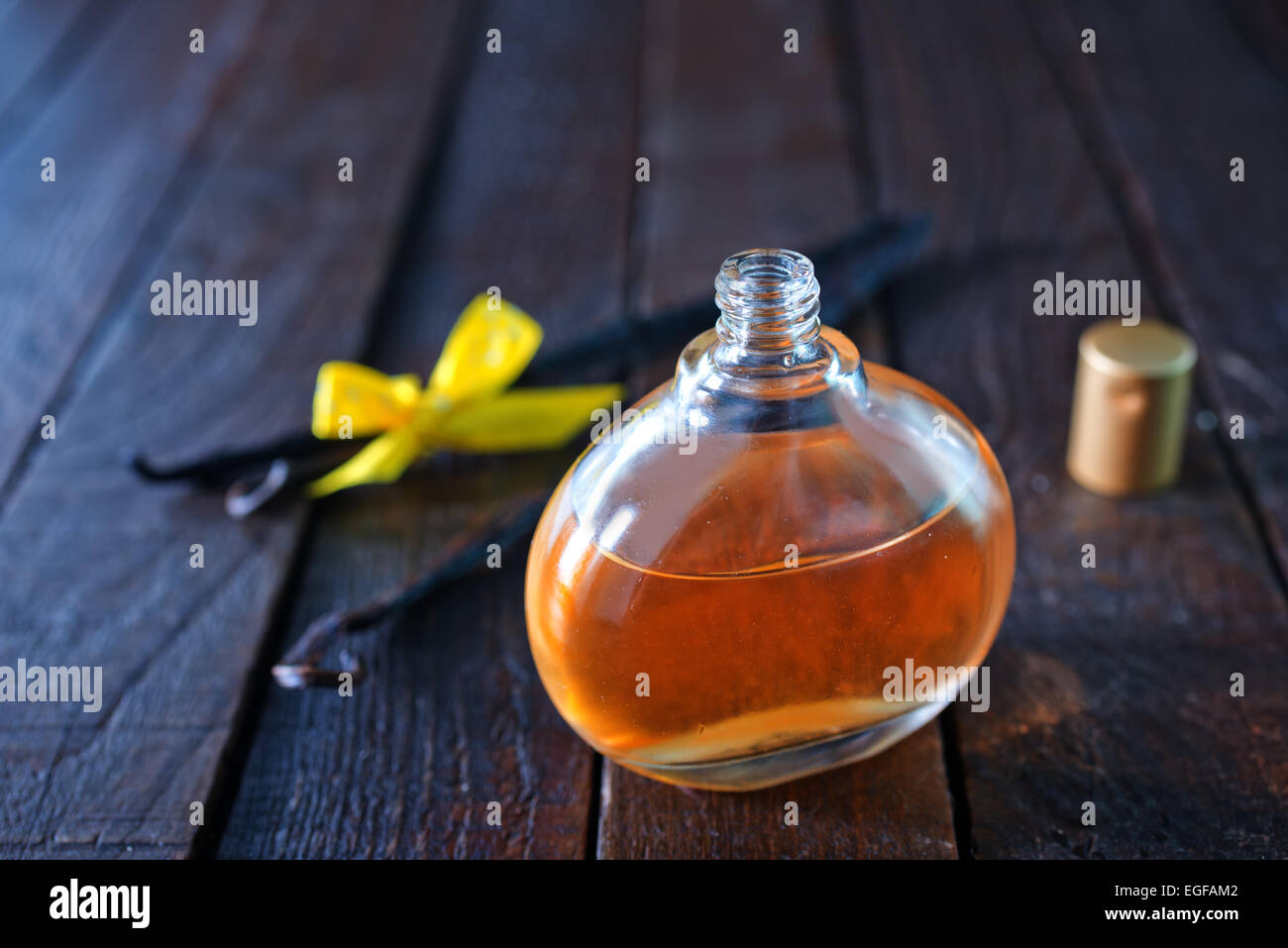 perfume in bottle and on a table Stock Photo - Alamy