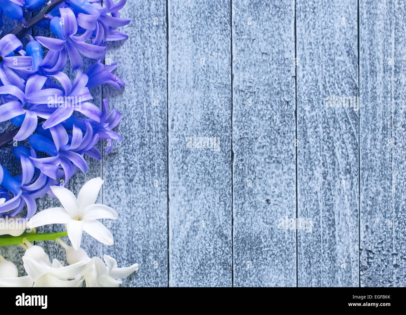 flowers on the wooden table, spring background Stock Photo - Alamy