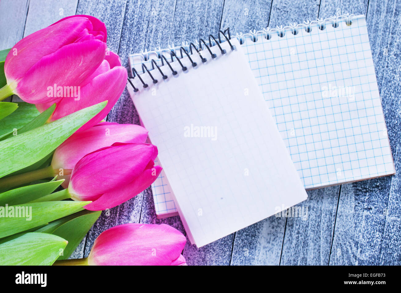 flowers on the wooden table, spring background Stock Photo - Alamy