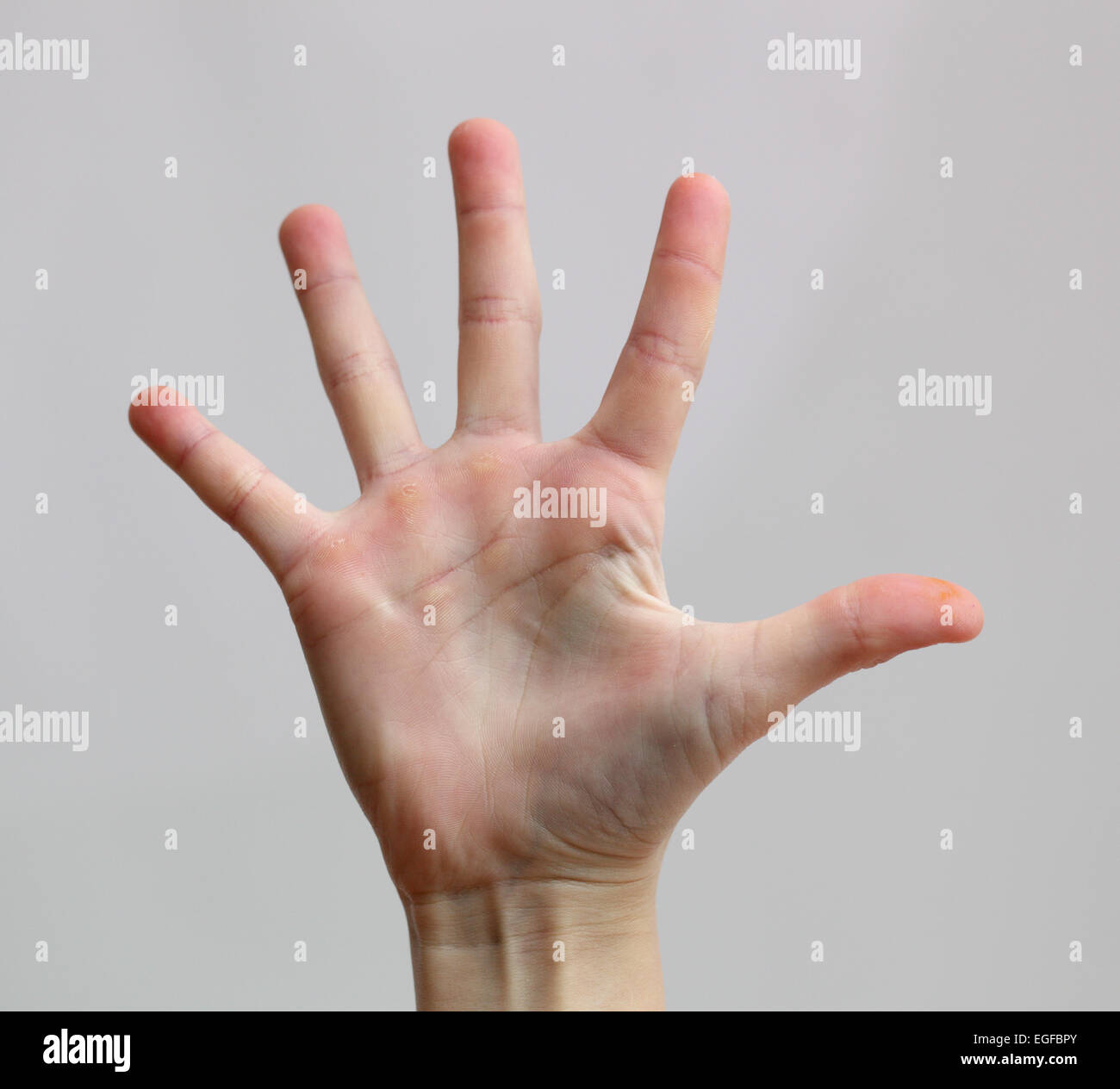 five finger on a gray background Stock Photo - Alamy