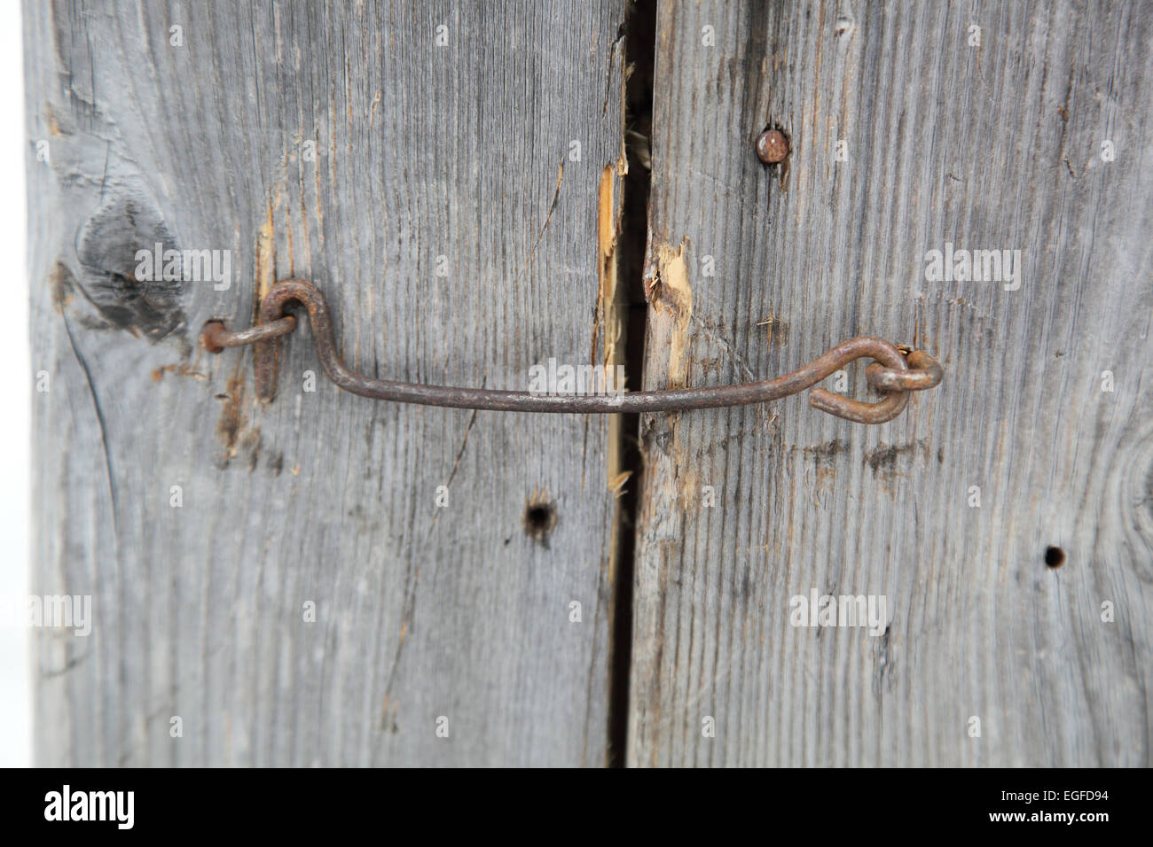 Old lock on wooden gate Stock Photo - Alamy