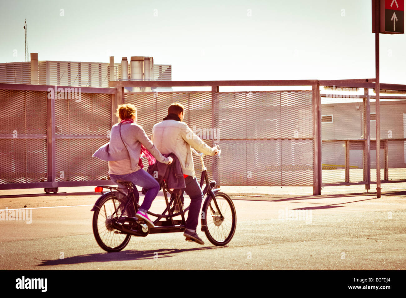 Couple on a tandem Stock Photo - Alamy