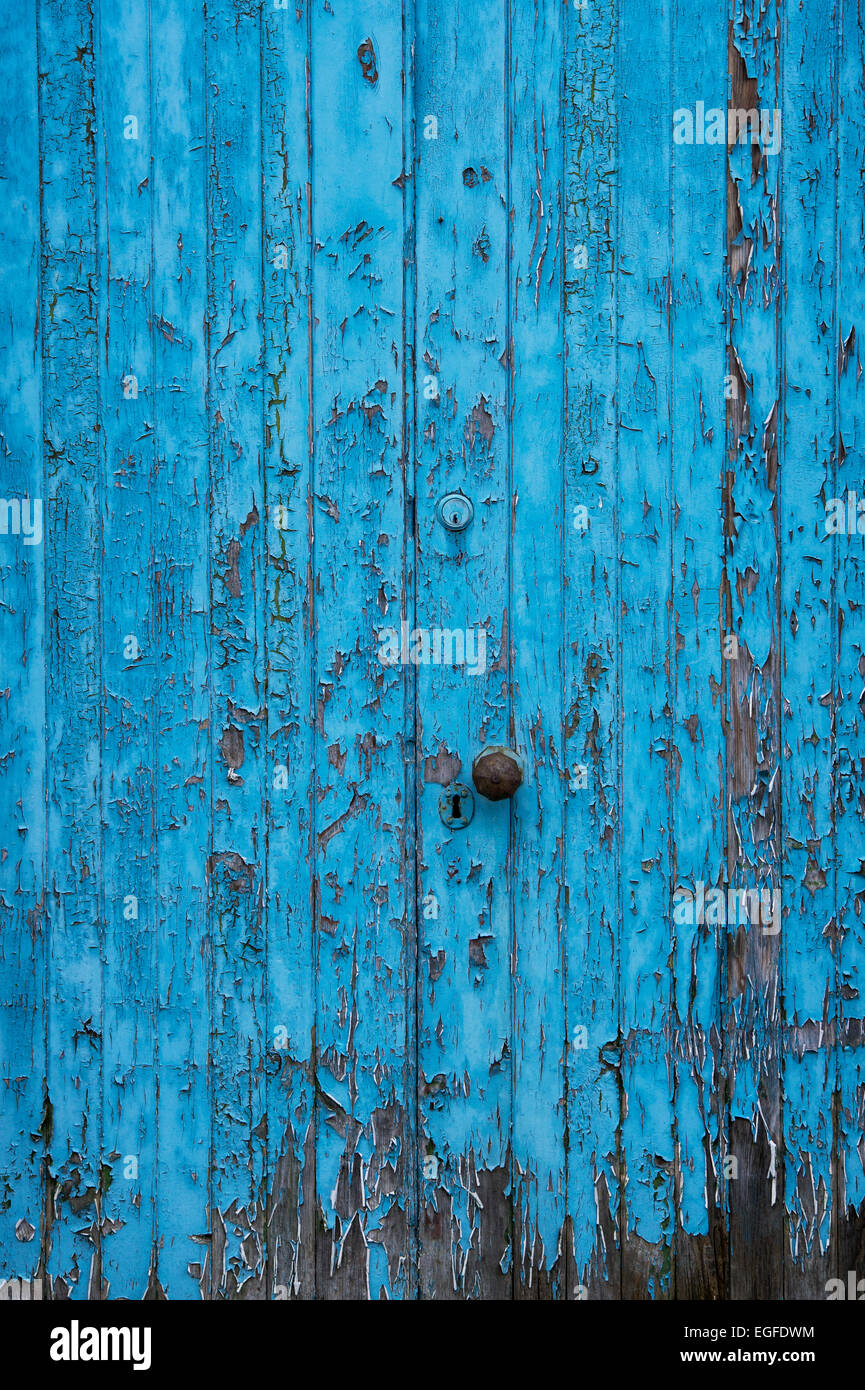 Old painted blue wooden door with peeling paint texture Stock Photo - Alamy