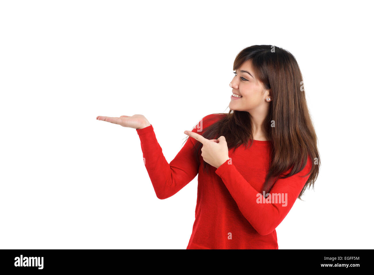 Woman pointing product on white background Stock Photo - Alamy
