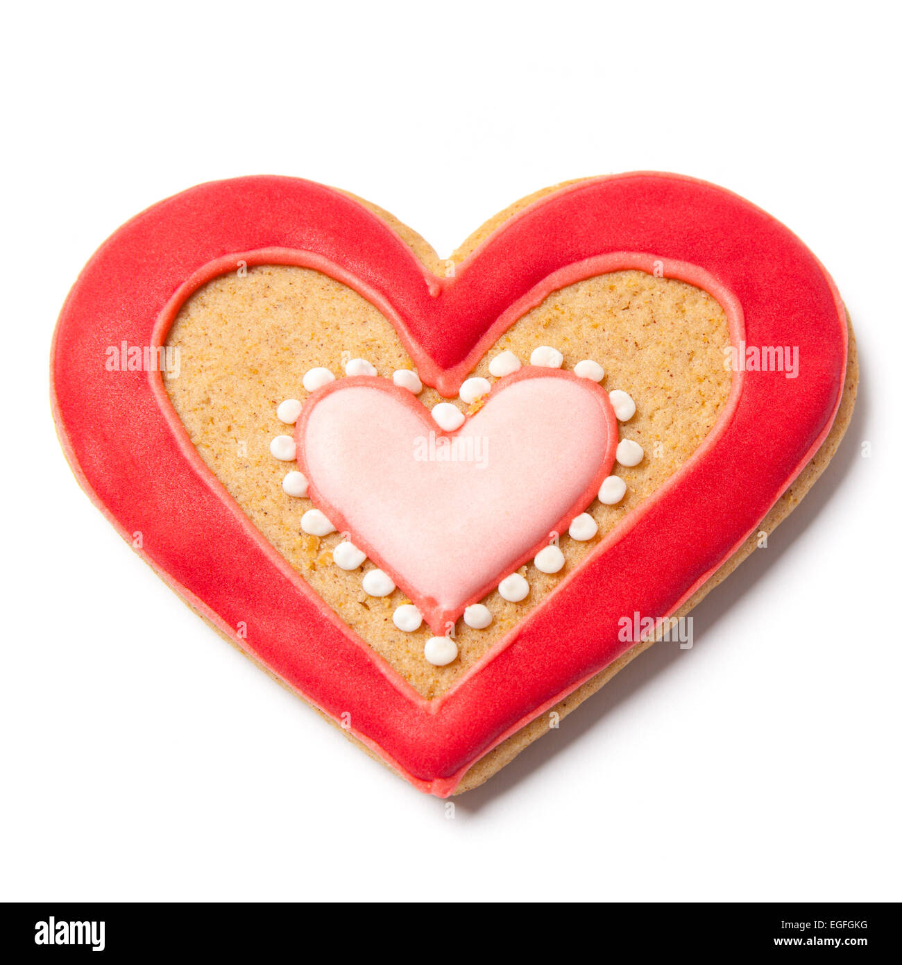 Saint Valentines gingerbread in a heart shape isolated on white ...
