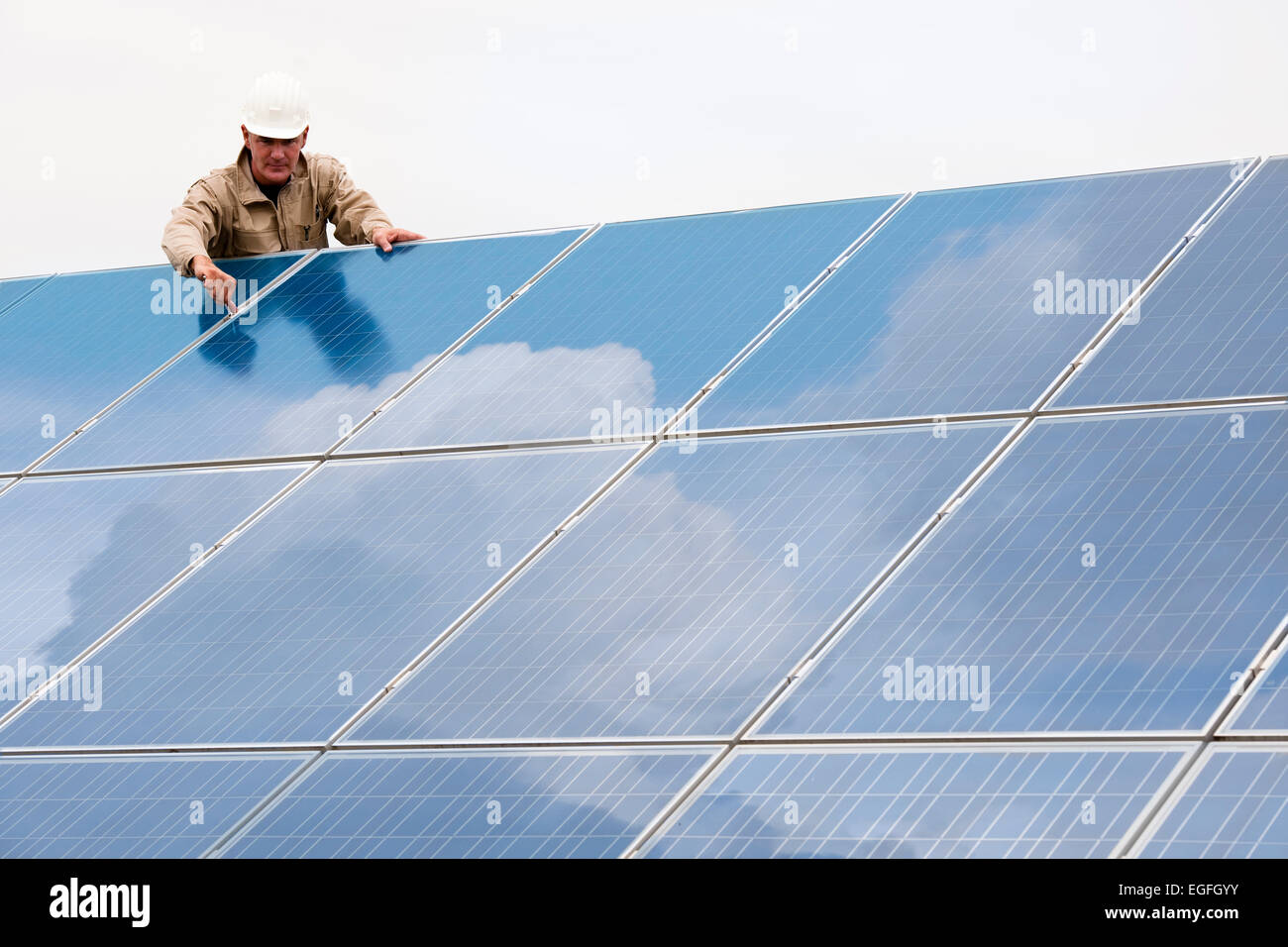Working On Solar Panels Stock Photo - Alamy
