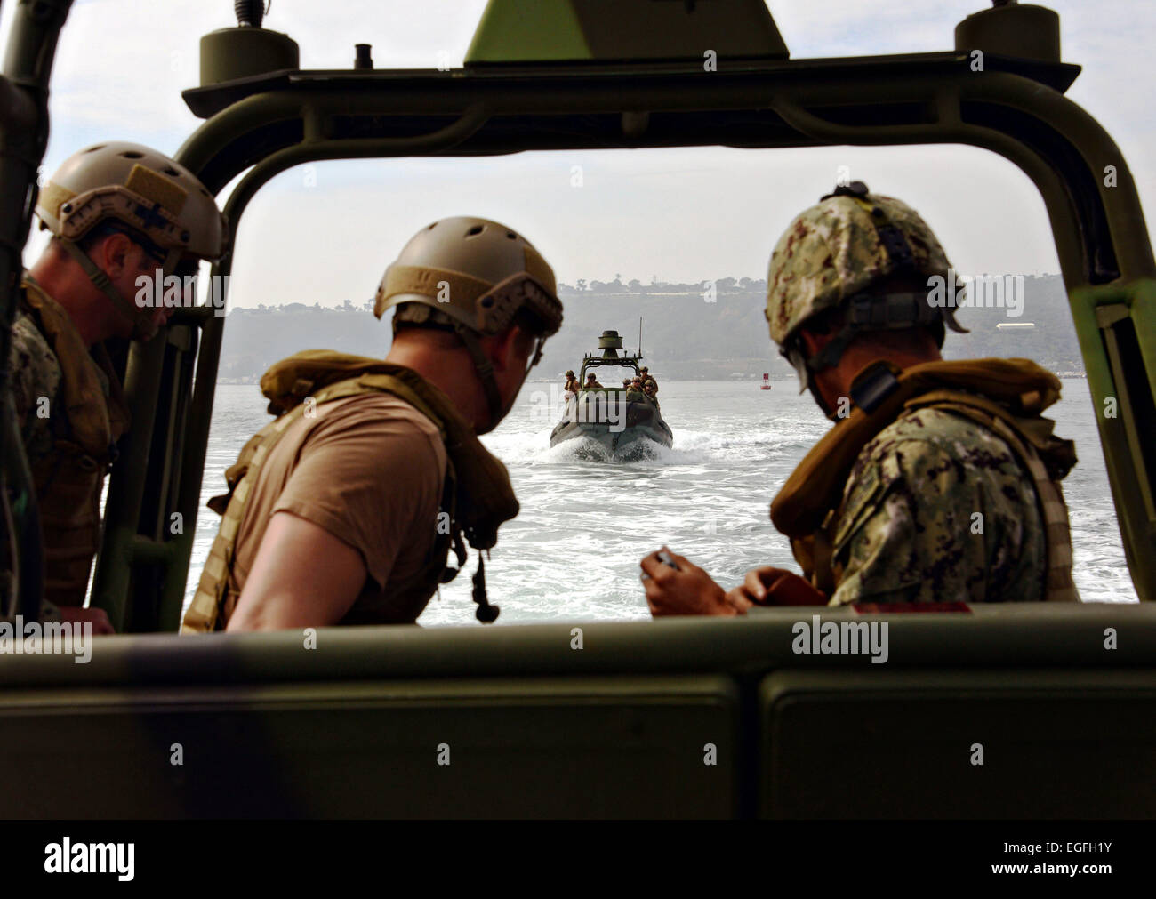 A US Navy Coastal Riverine Squadron Three during a harbor security ...