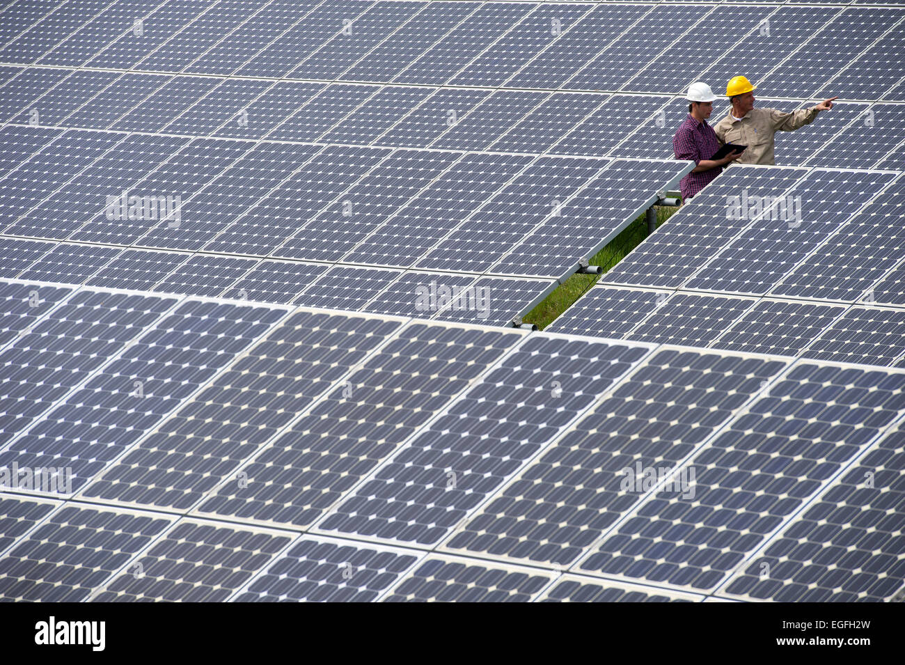 Technicians inspection at Solar Power Station Stock Photo - Alamy
