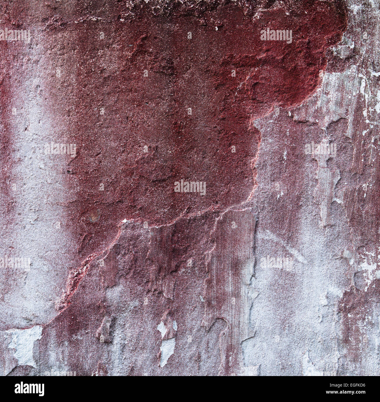Broken concrete wall and faded red paint Stock Photo - Alamy