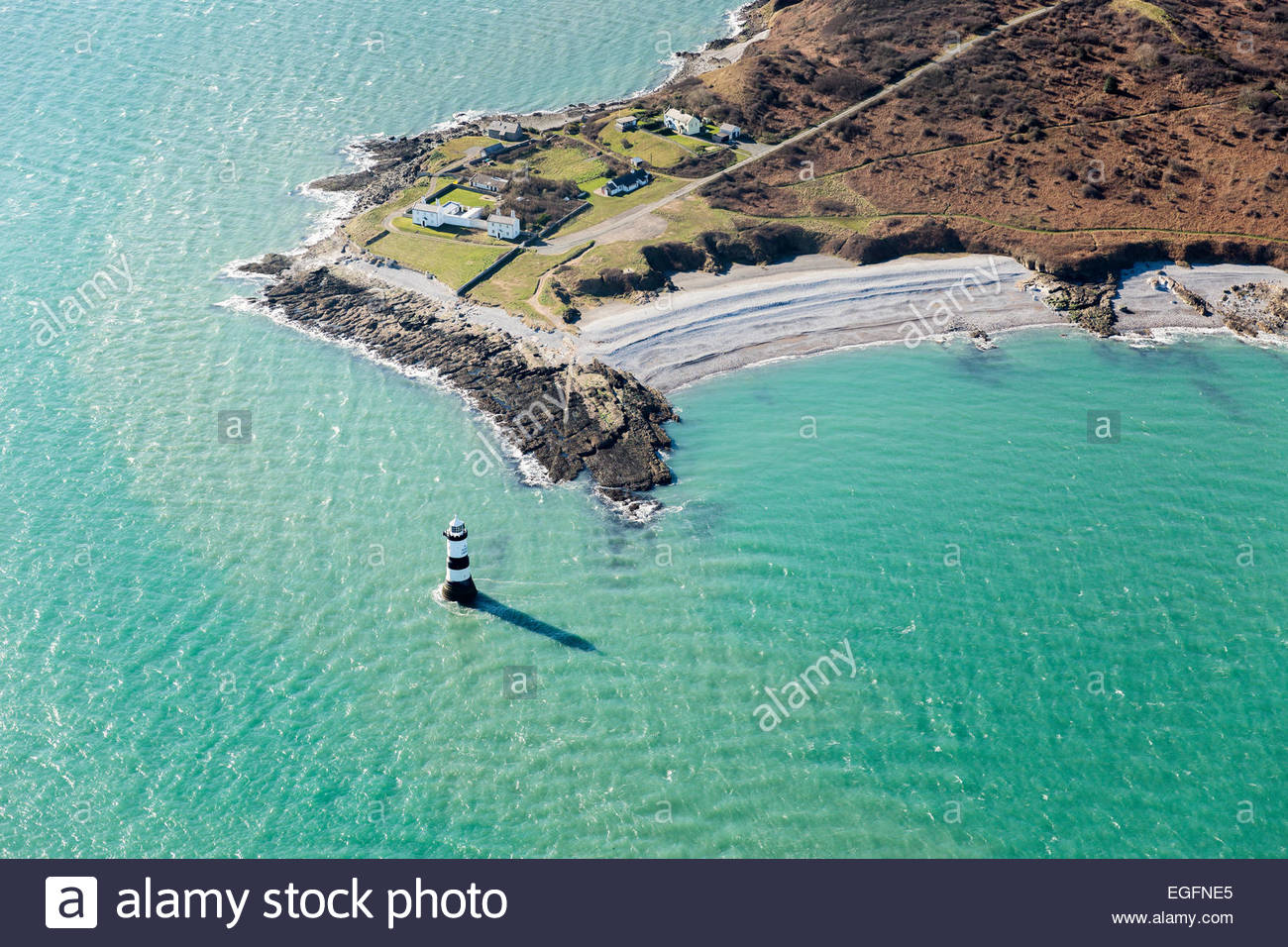 Penman Lighthouse with sailing boat Stock Photo - Alamy