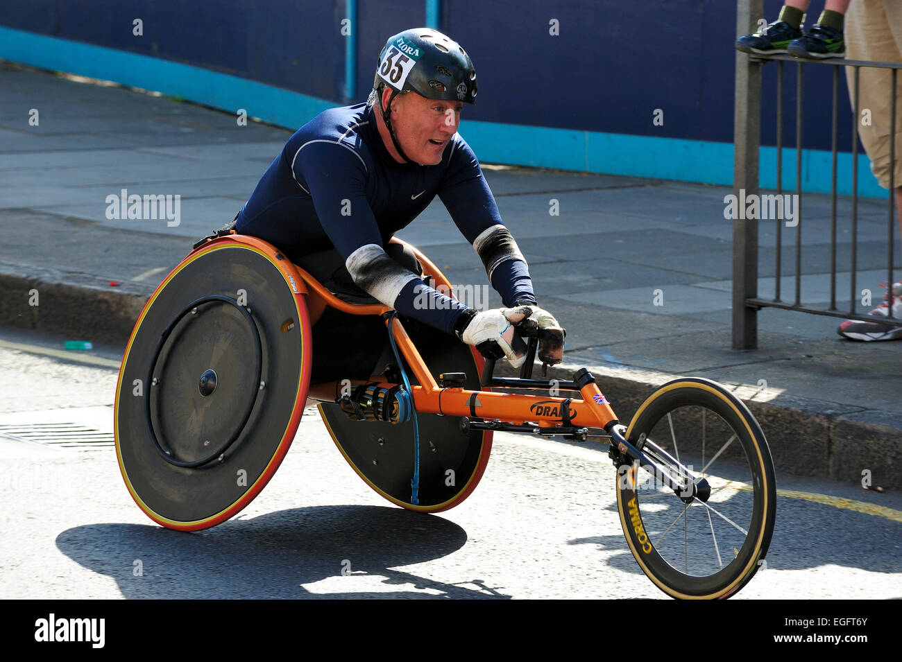 Disabled athlete taking part in the London marathon wheelchair race ...