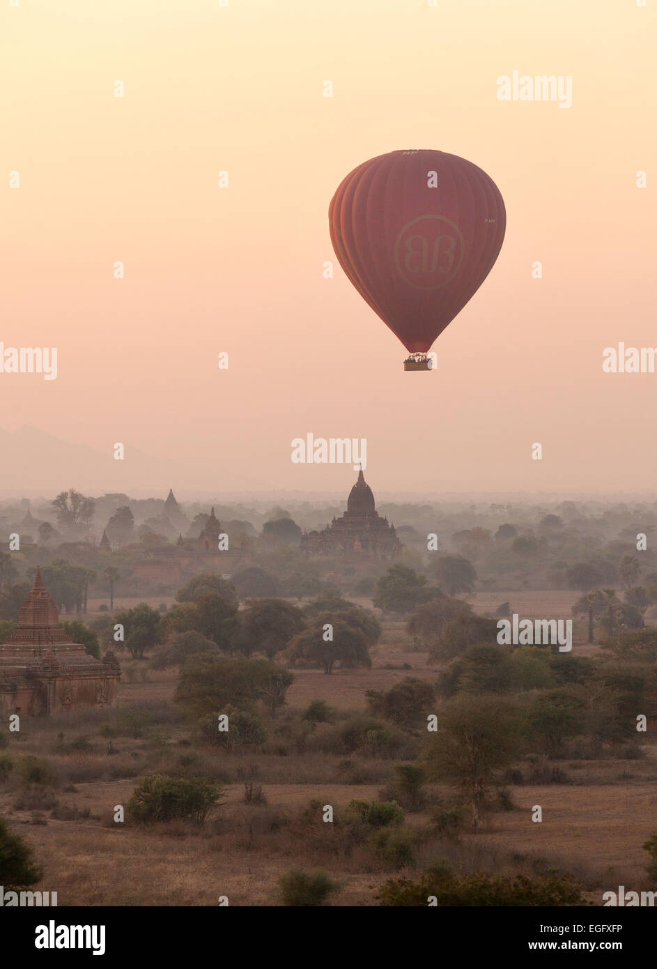 Hot air balloon Myanmar. A hot air balloon over the temples of the ...