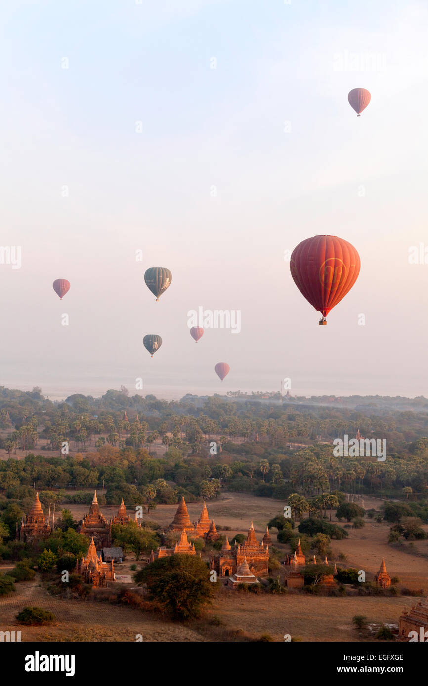 Hot air balloons over temples at sunrise, Bagan plain, Myanmar ( burma ...