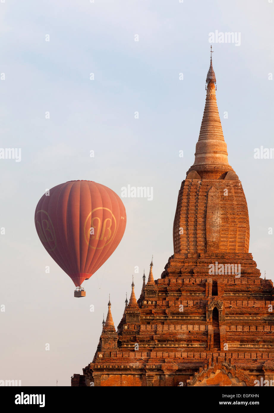 A hot air balloon passing a temple, Bagan, Myanmar ( Burma ), Asia ...