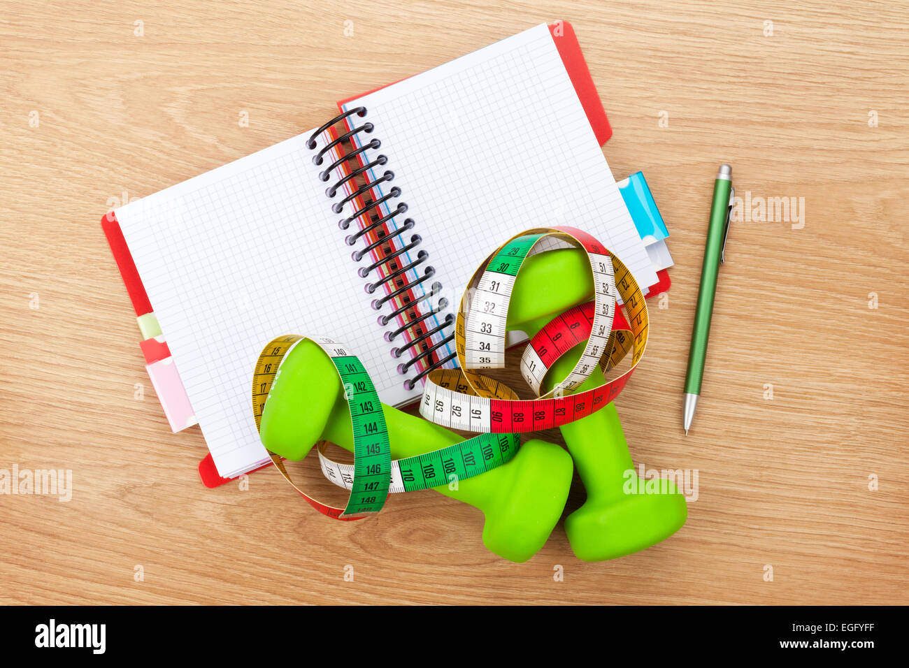 Dumbells, tape measure and notepad for copy space. Fitness and health ...