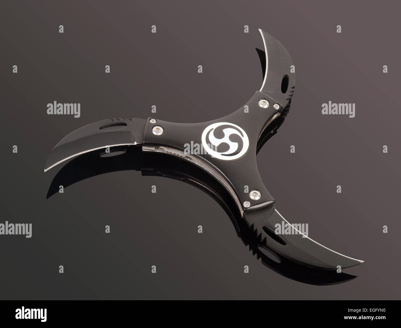 flying knife with reflection, isolated Stock Photo - Alamy