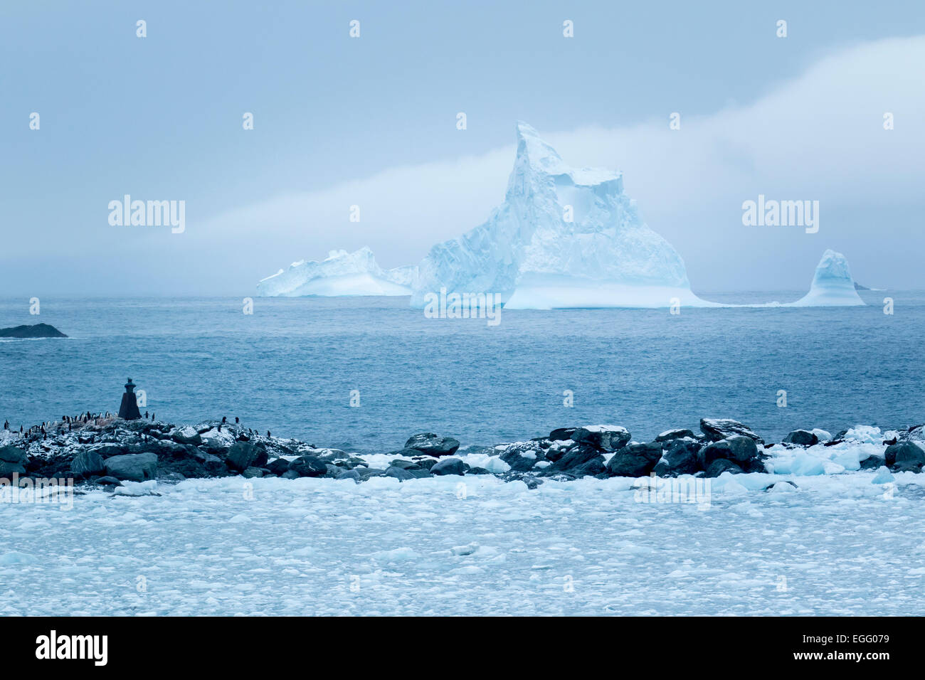 An iceberg floats in the distance off the coast of Point Wild, Elephant ...
