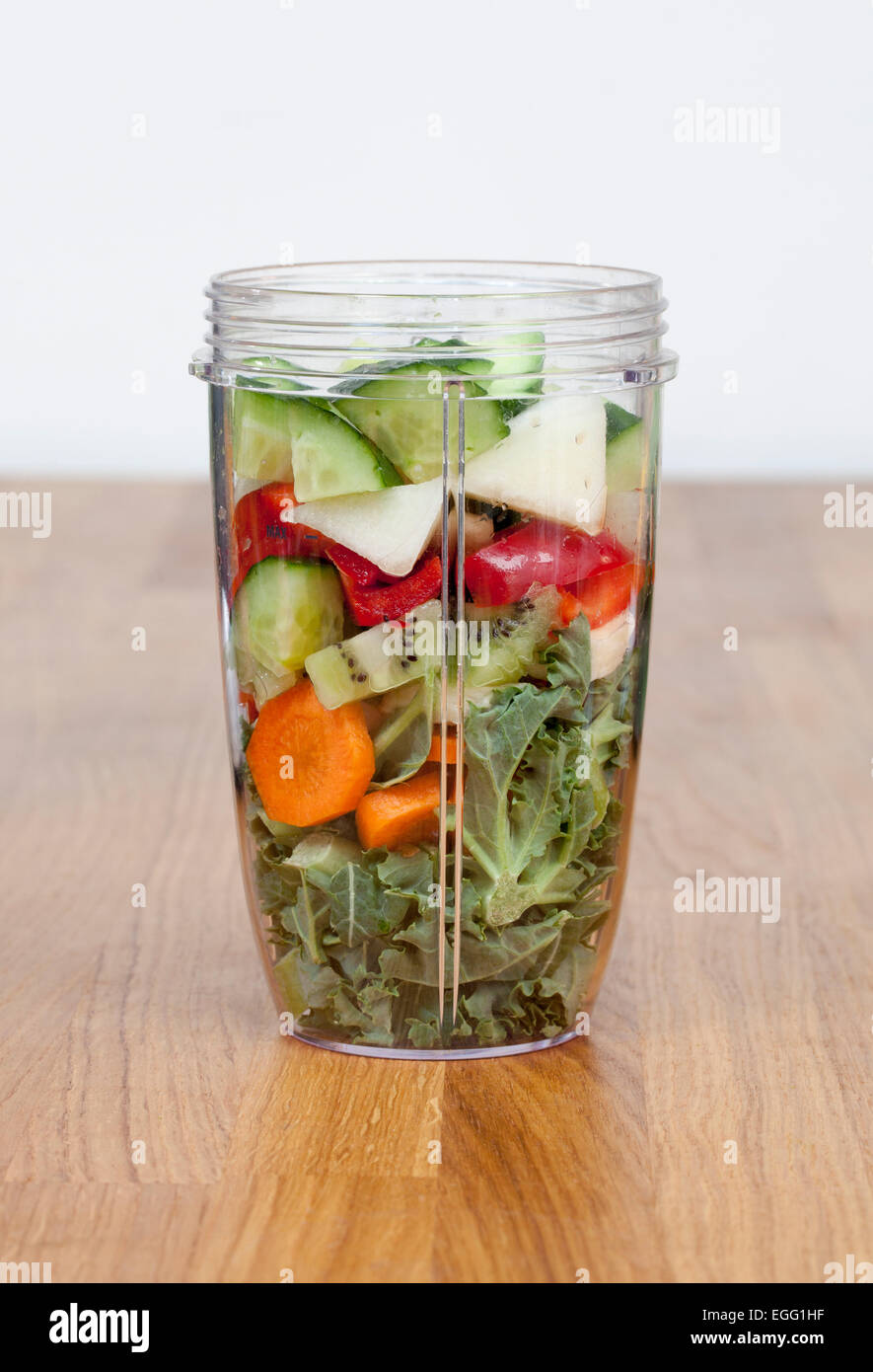 Nutribullet Food Extractor with raw fruit and vegetable ready for ...