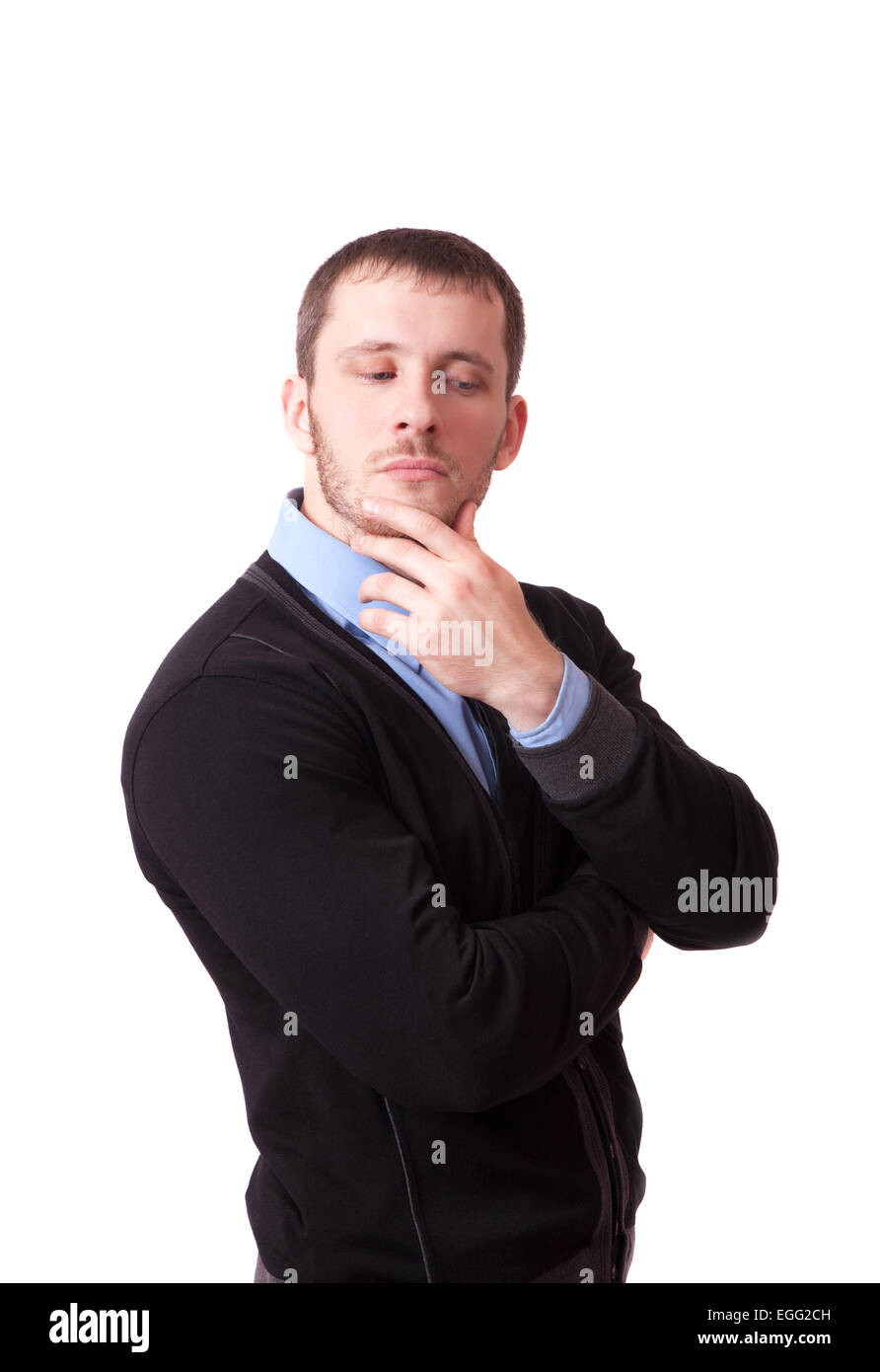 Young businessman rubbing chin hi-res stock photography and images - Alamy