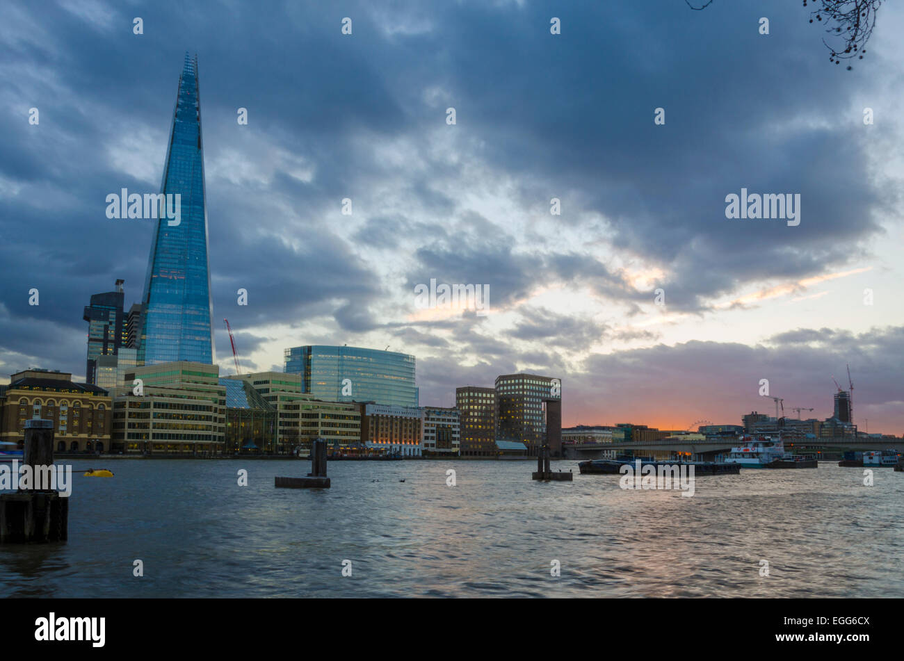 London, UK. 24th February, 2015. UK Weather: Sunset and cloudy sky over ...
