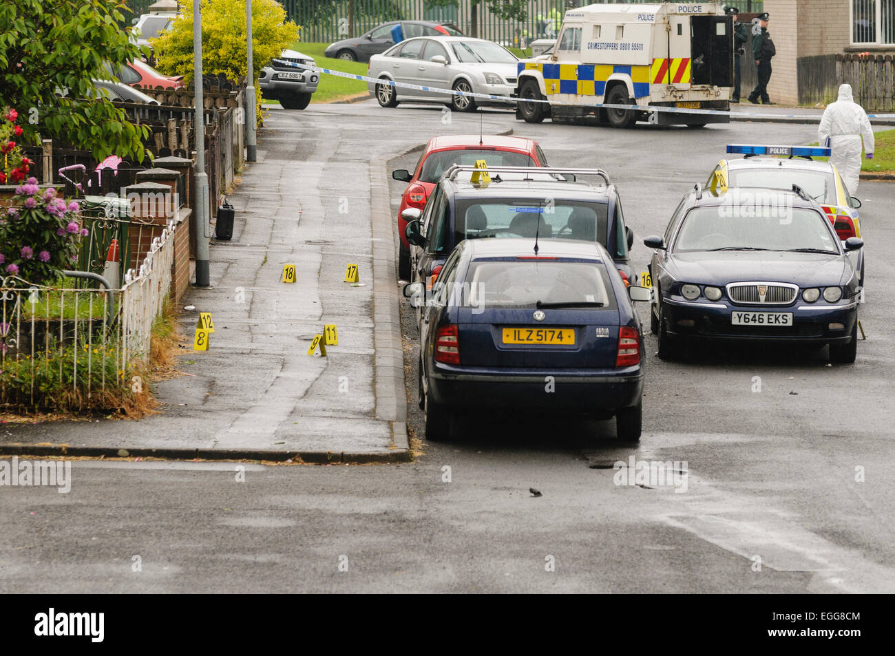 PSNI Forensics Officer examines the scene after a pipe bomb explodes ...