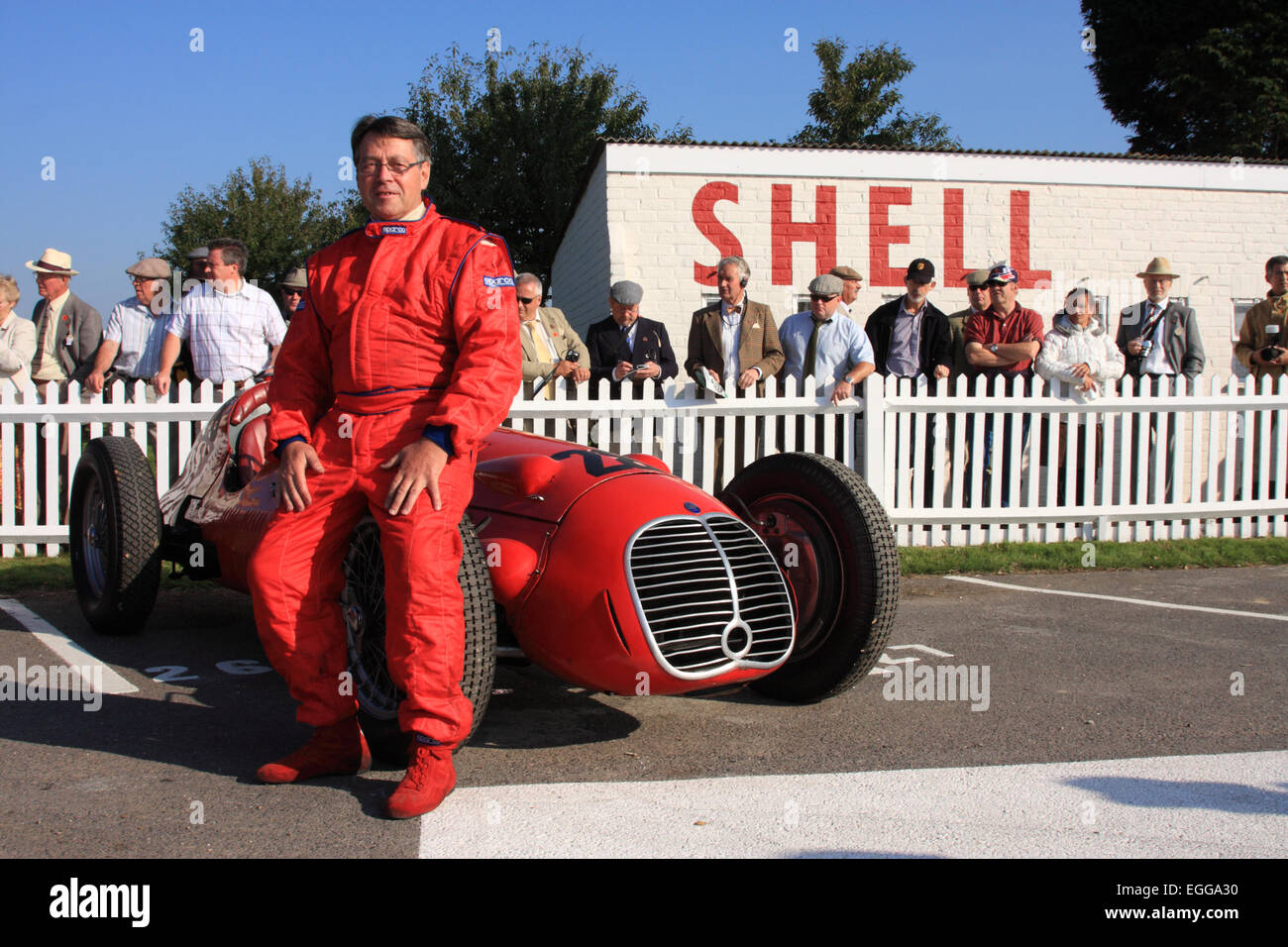 Immediately prior to a race, cars & drivers move to the assembly area ...