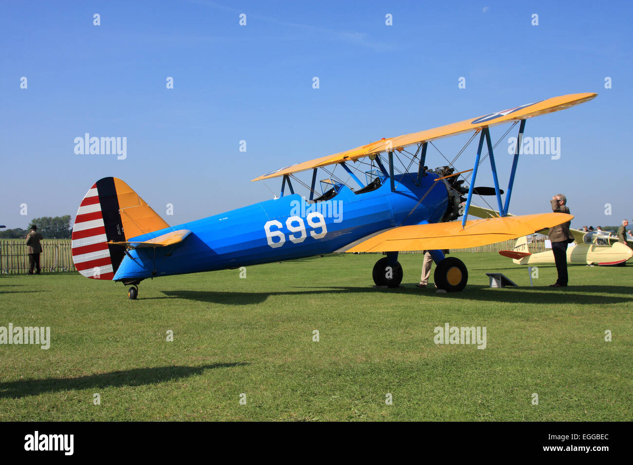 A 1943 Boeing B75 Stearman against a cloudless blue sky at the annual ...